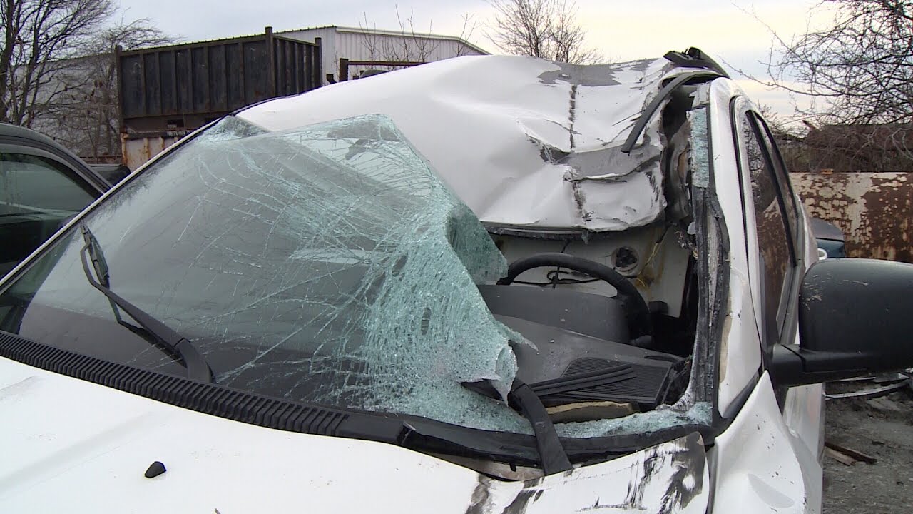 'It just banged into my windshield:' Driver injured by tire - YouTube
