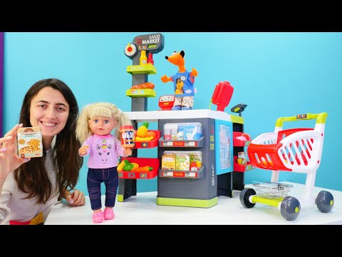 Baby born oyuncak bebek Mira ve Sevcan market alışverişine gidiyorlar. Kız oyunları