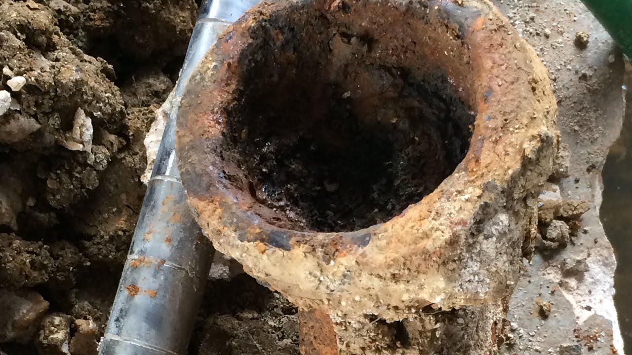 Collapsed cast iron drain - YouTube