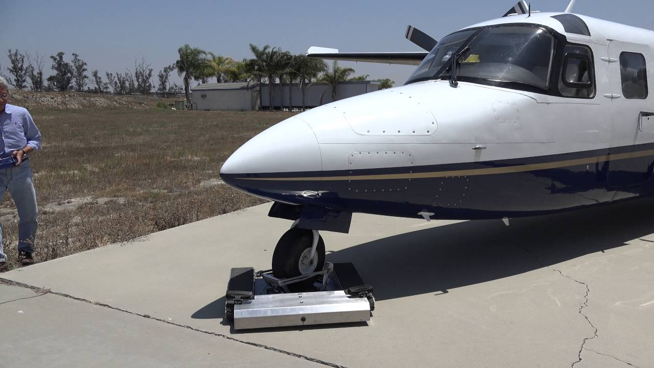 Smooth and Efficient: AC Air Technology T2 Tug Moving Twin Turbo ...