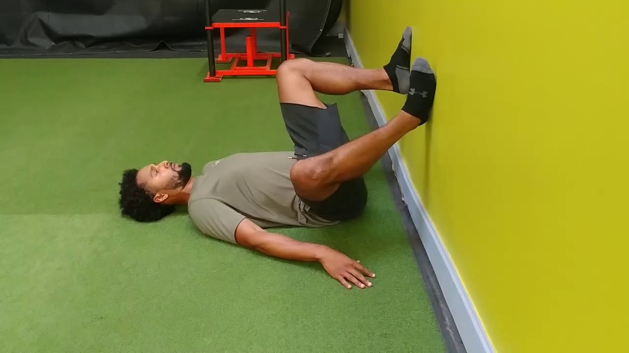 Olympic Wall Squat External Rotation - YouTube