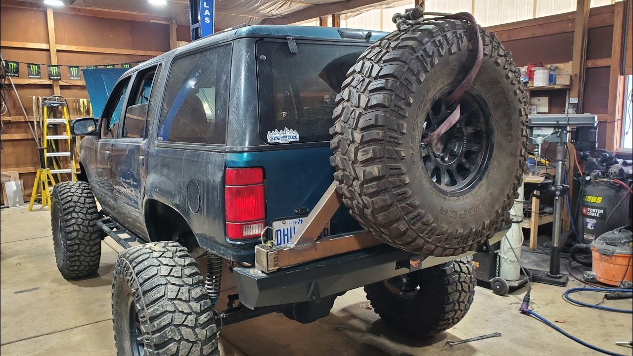 I built a swing out tire carrier for my V8 1 Ton 1st Gen Ford Explorer ...