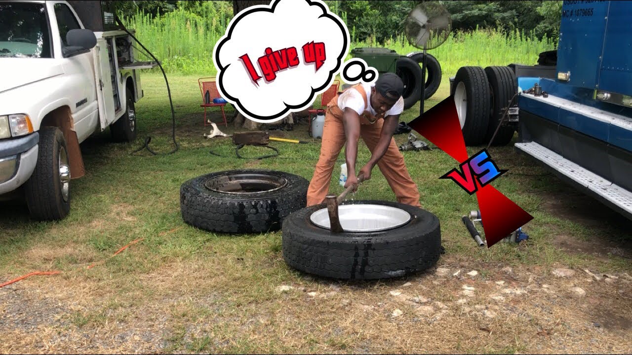 Changing semi truck tires - YouTube