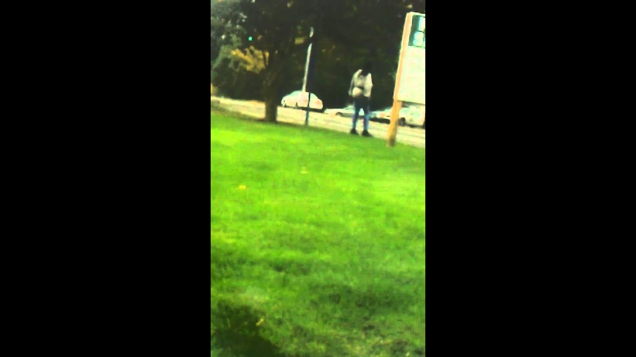 Lady dancing at bus stop - YouTube