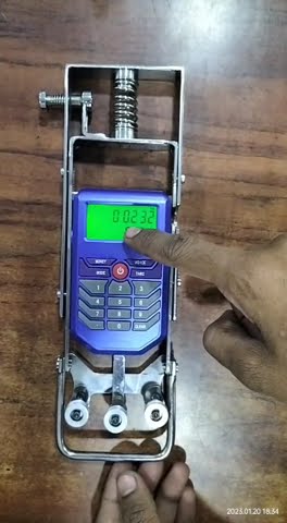 Spring loaded cable Yarn tension meter sensitivity check - YouTube
