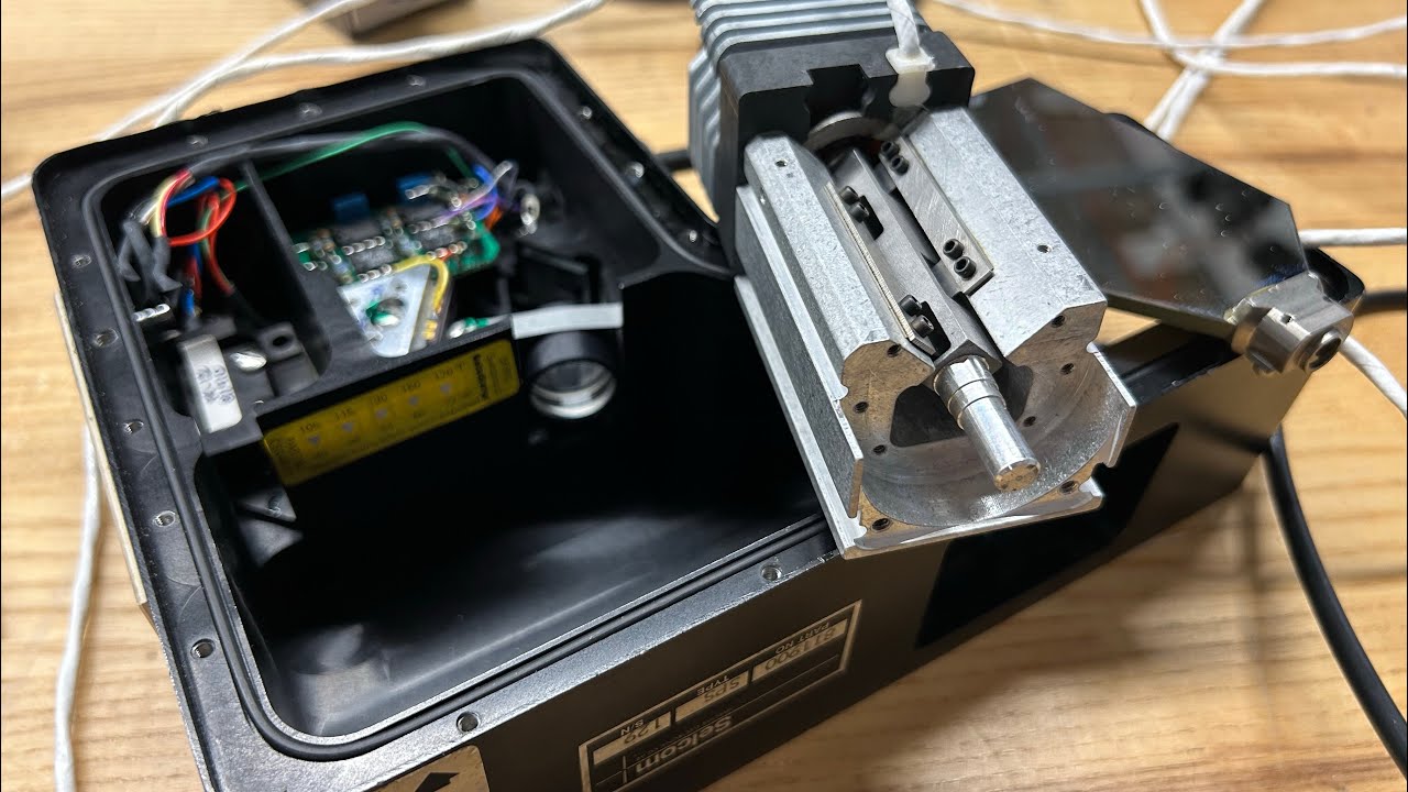 Precision laser sensor teardown (flexures?!?!) - YouTube
