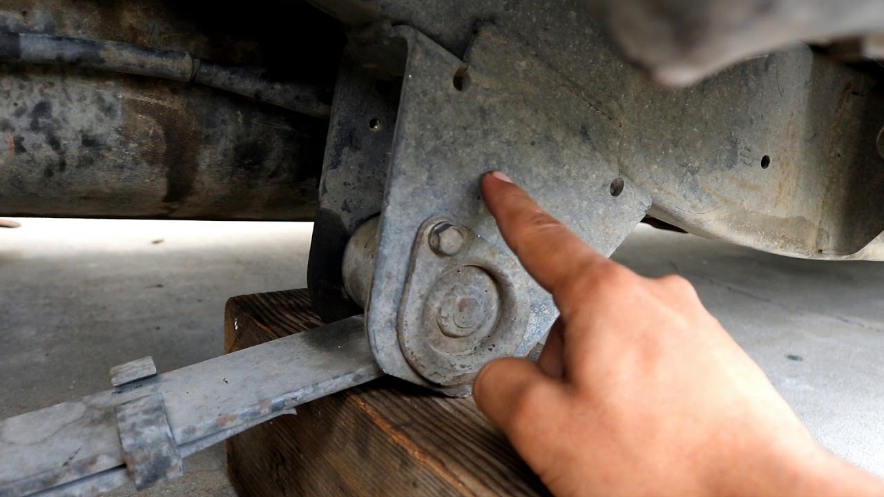 How to Re-drill leaf spring hangers on a d21 hardbody - YouTube