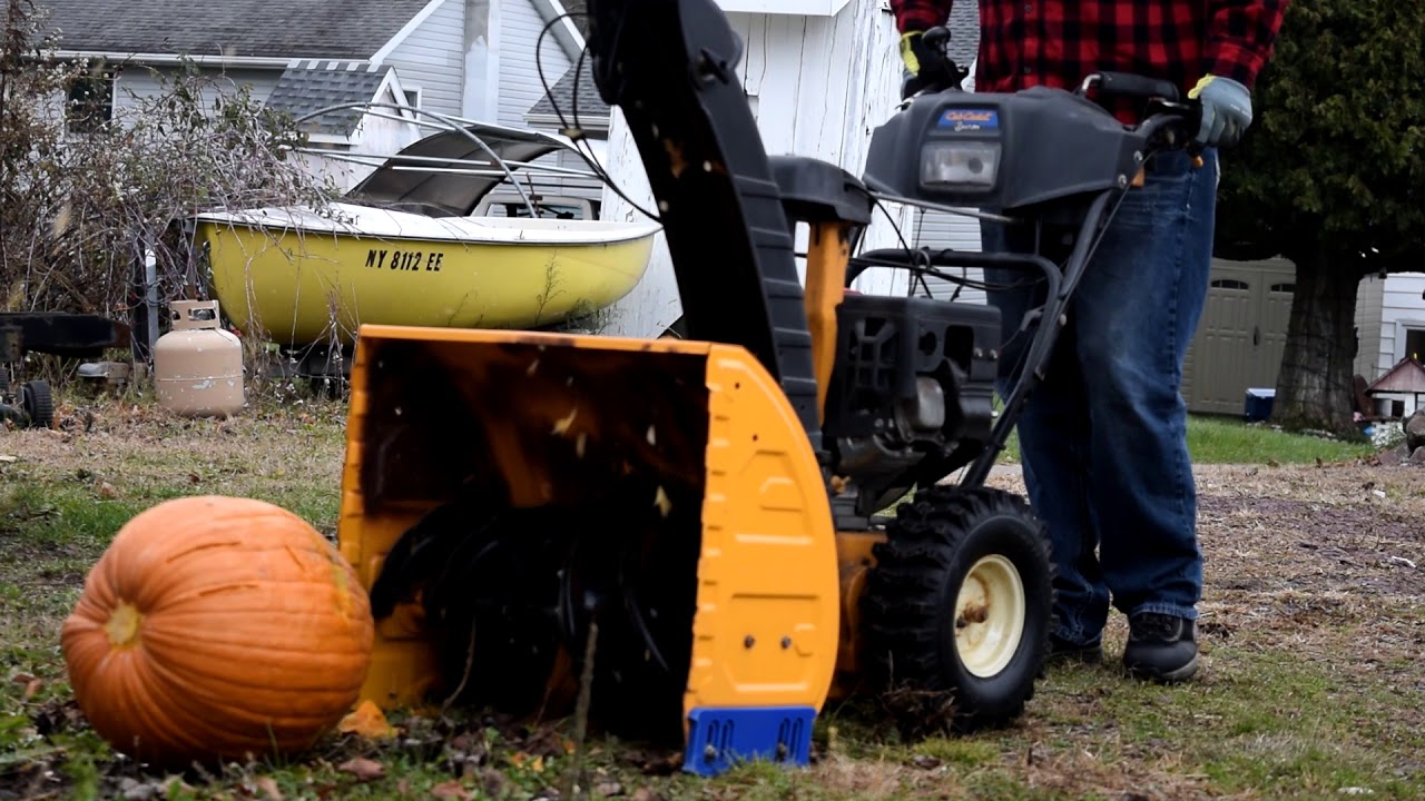 pumpkin in a snow blower - YouTube