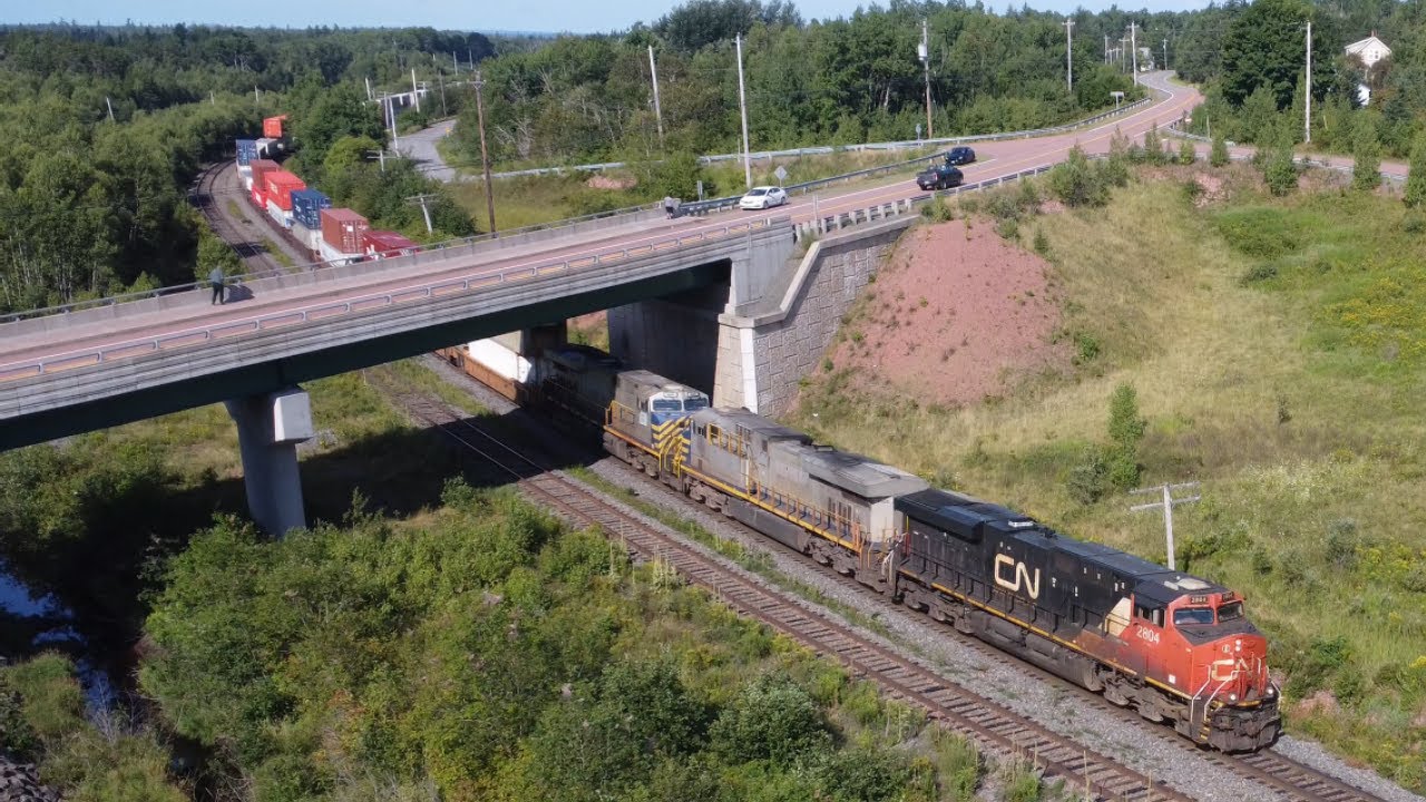 Awesome 4K Aerial View! Long Stack Train CN 120 w/Rear DPU Passing ...