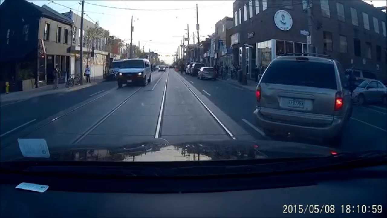 cyclist passing right turning car on the right - YouTube