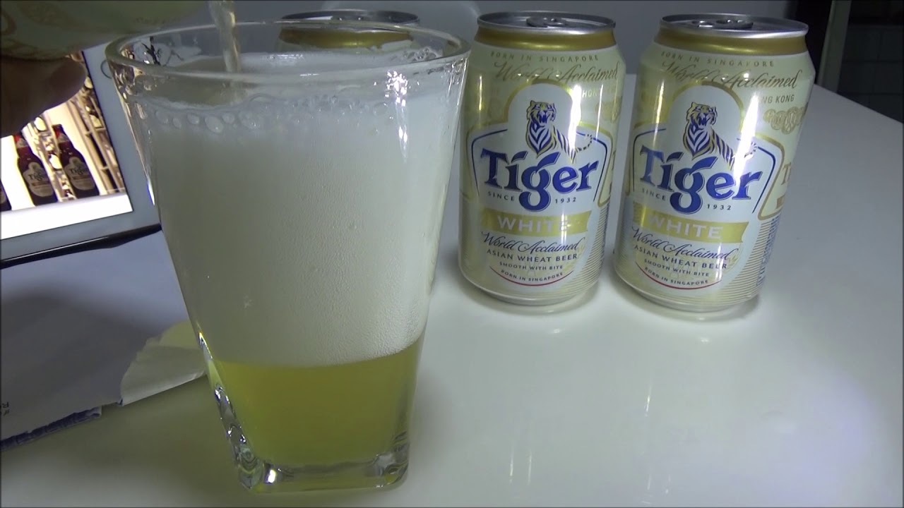 Tiger White Wheat Beer Singapore Having a Drink - YouTube