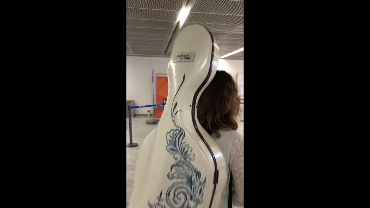 Austrian Airlines : does a cello fit in an airplane seat ? - YouTube