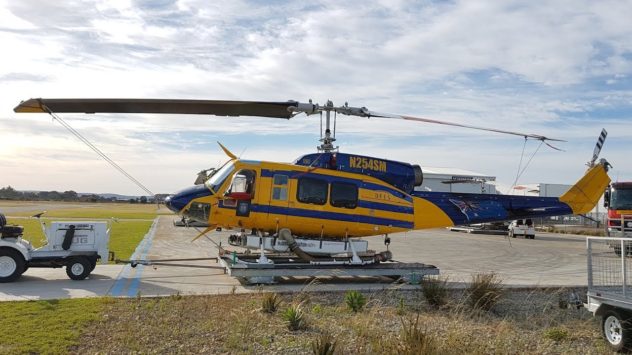 Bell 214 Takeoff (Carrying water tank, firefighting) - YouTube