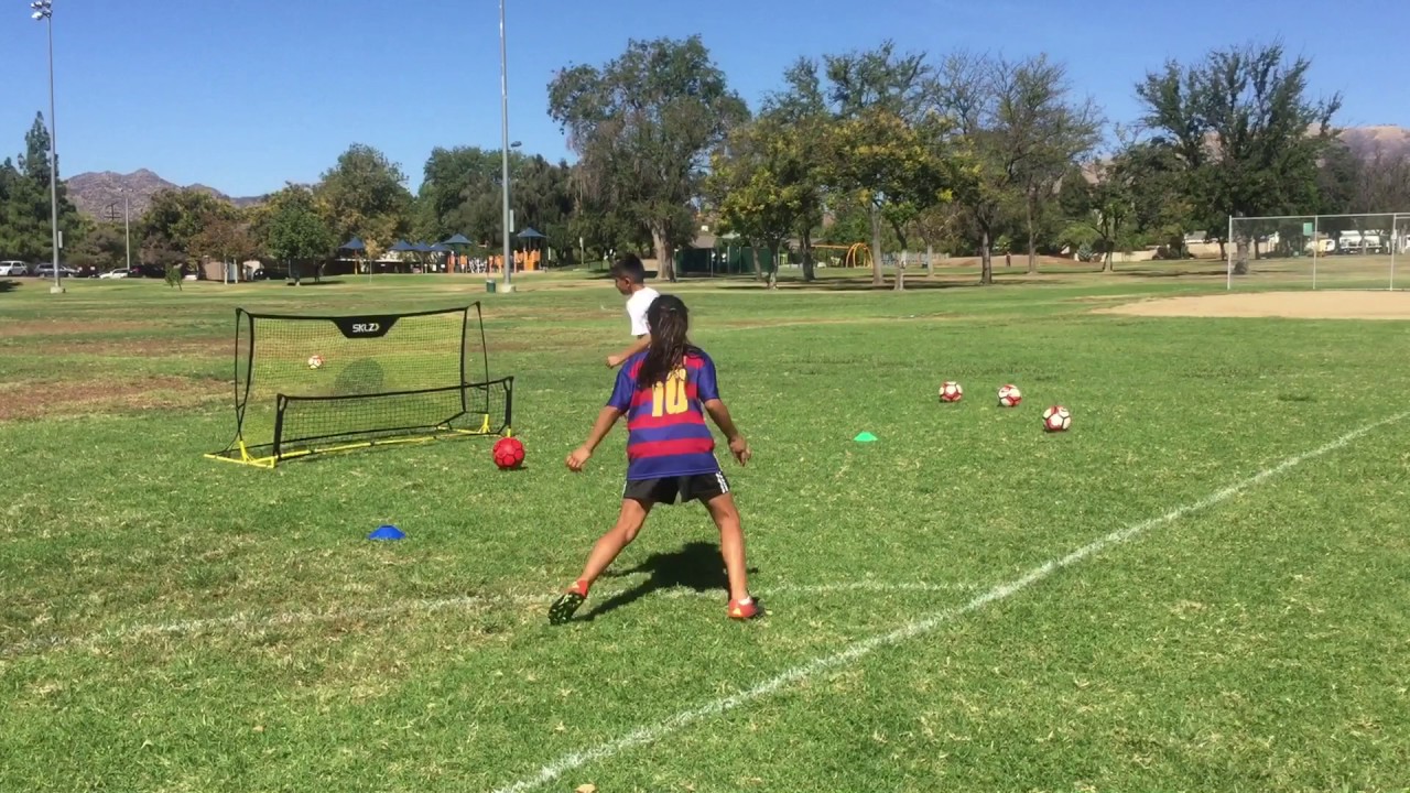 JUKE SOCCER 2004 & 2005 player warming up with the SklZ rebounder - YouTube