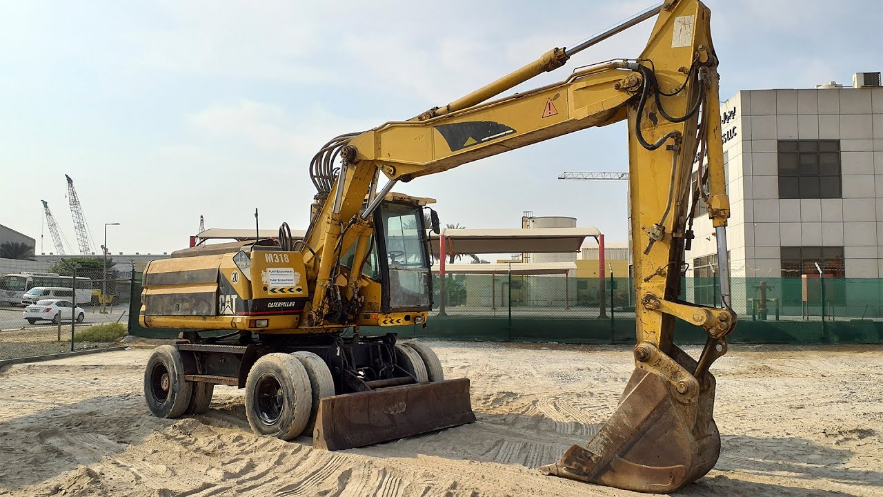2004 Caterpillar M318 Wheeled Excavator | P&E Auctions - YouTube