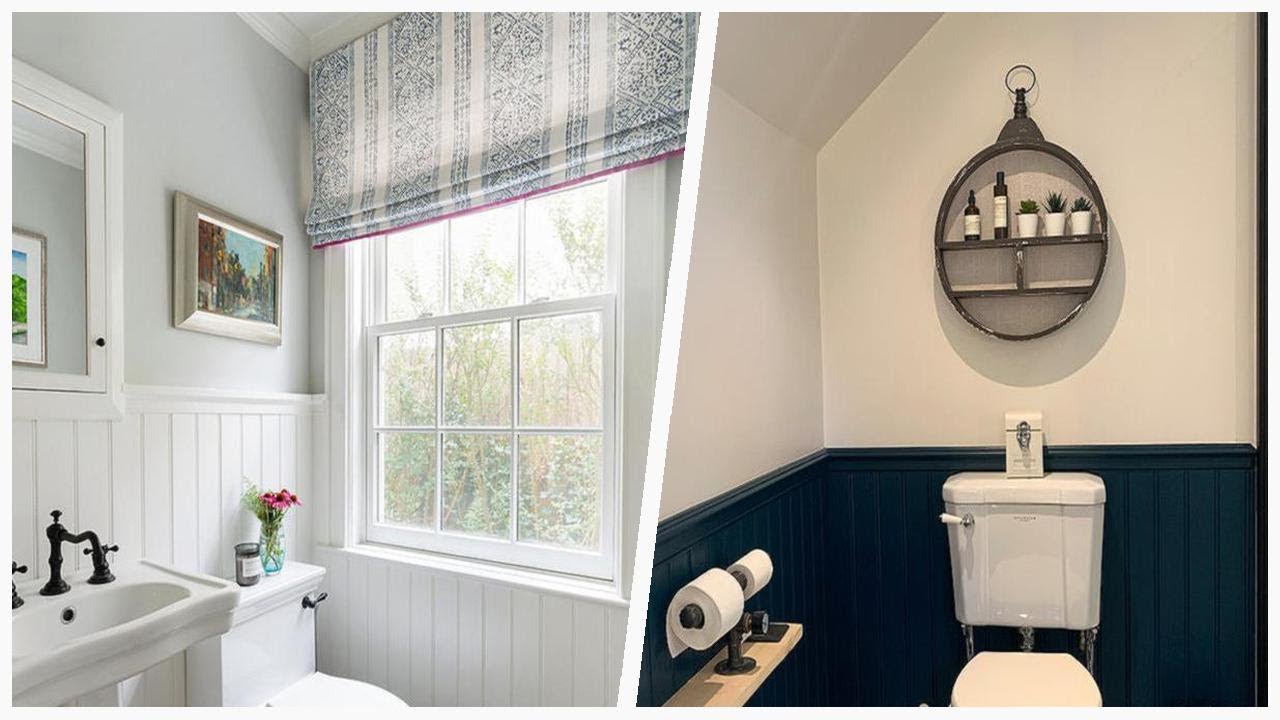 75 Wall Paneling Powder Room With White Cabinets Design Ideas You'll ...