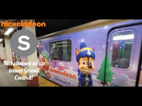 42 Street Shuttle train with "Nickelodeon" wrap leaves Grand Central ...