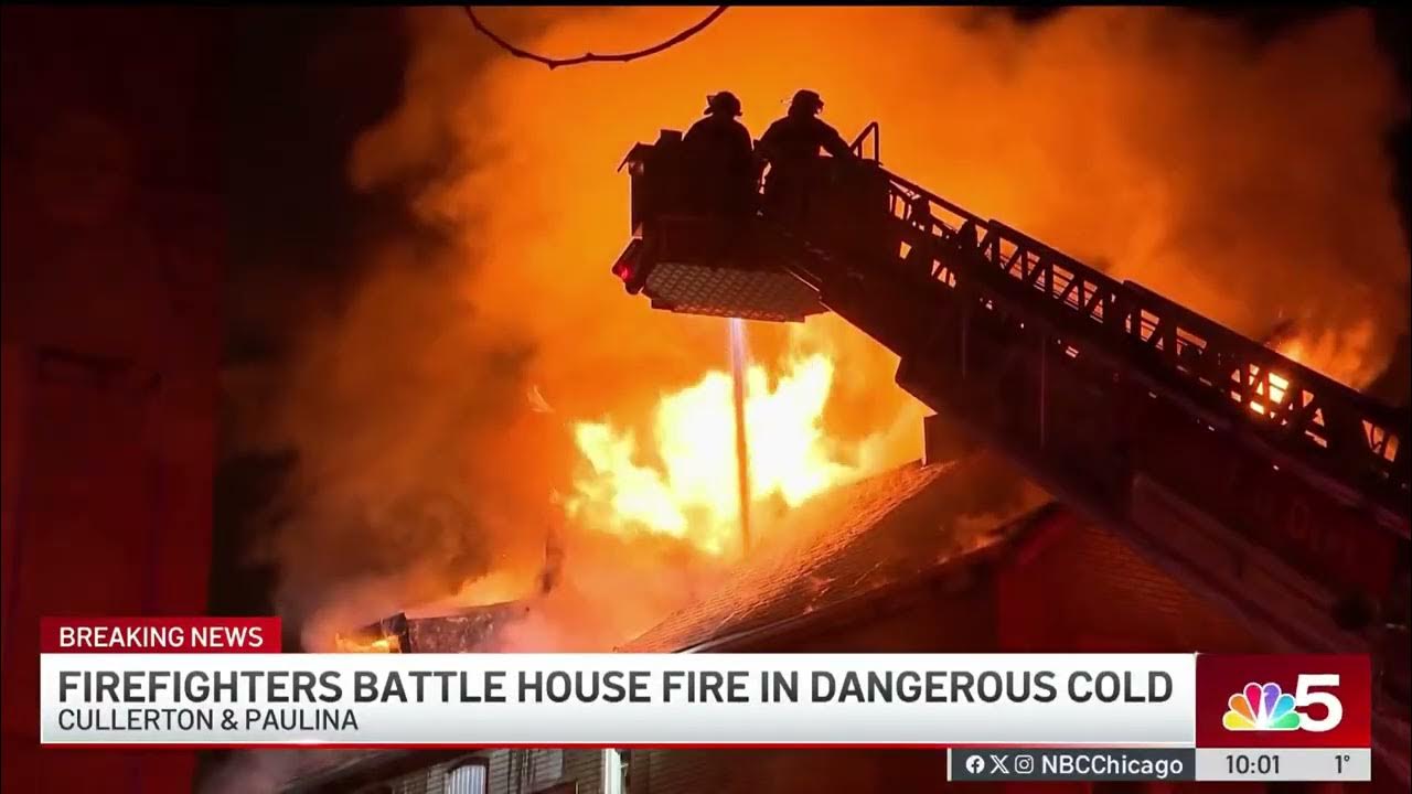 Firefighters BATTLE flames in frigid cold temperatures at Lower West Side home - YouTube