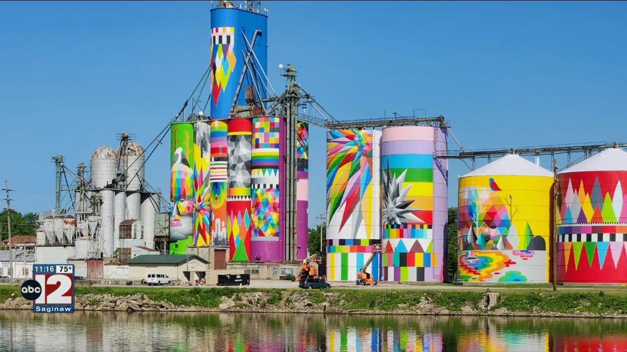 Artist completes silo mural along Saginaw River - YouTube