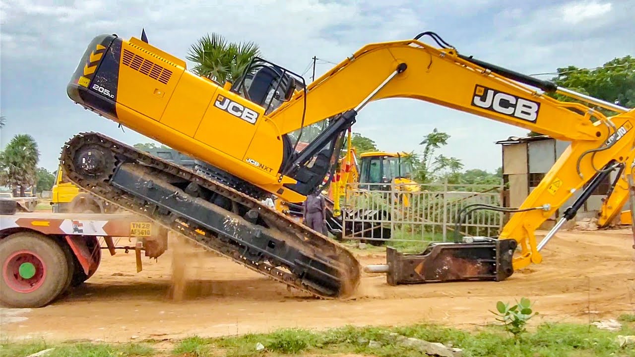 New JCB 205 Excavator Delivery at JCB Showroom | Loading and Unloading ...