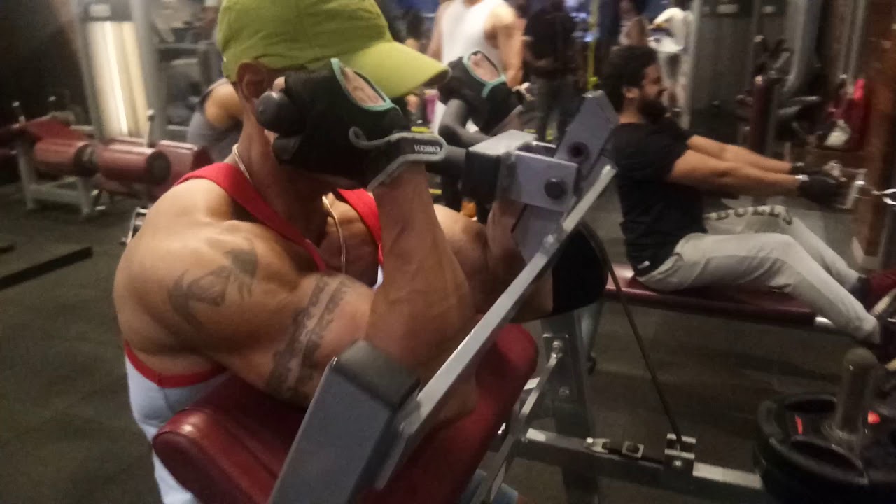 Best preacher curl workout position for arms - YouTube