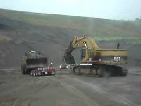 Loading Broken Loader Onto Float - YouTube