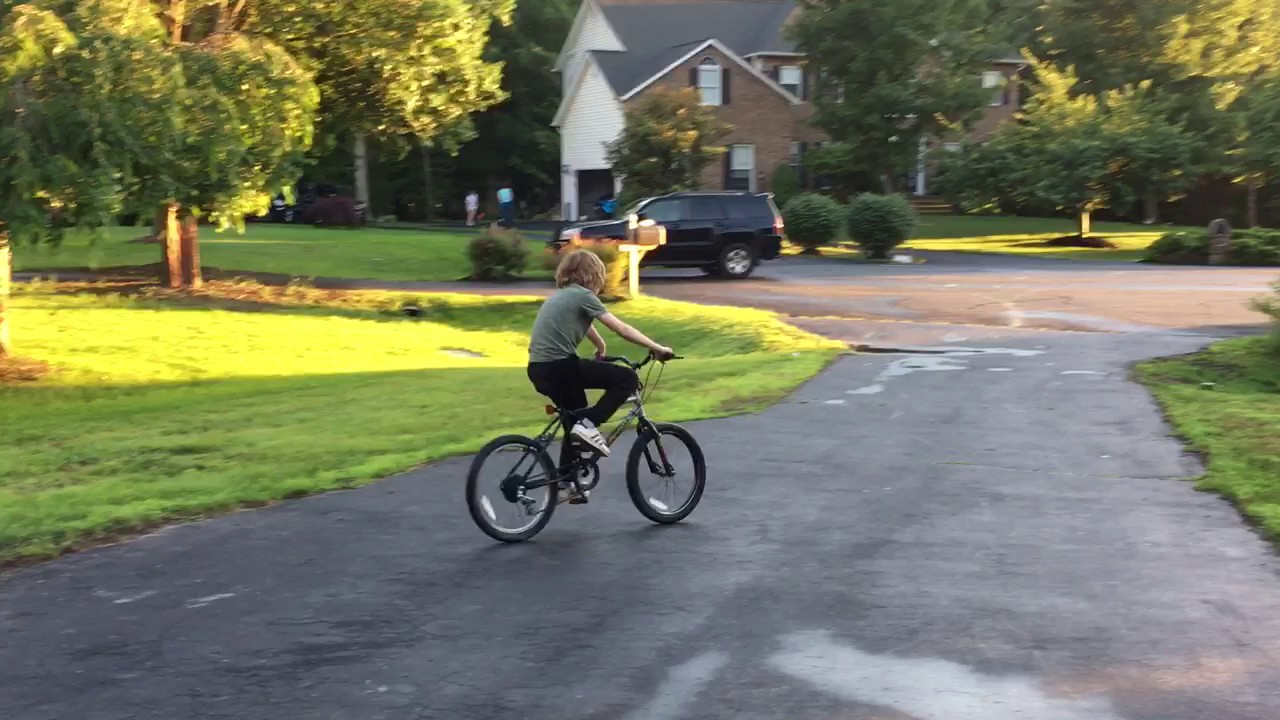 Logan on new bike - YouTube