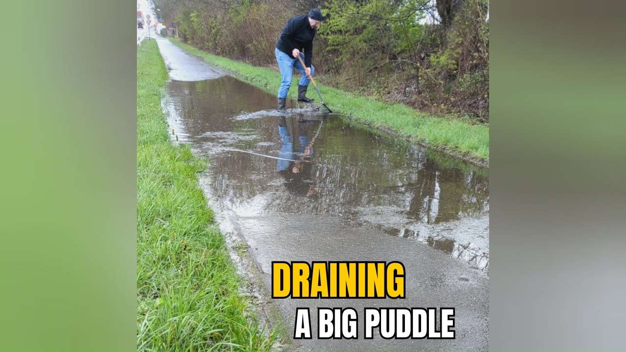 #035-1 - Time Lapse - Draining a puddle onto a cycle path in Germany ...