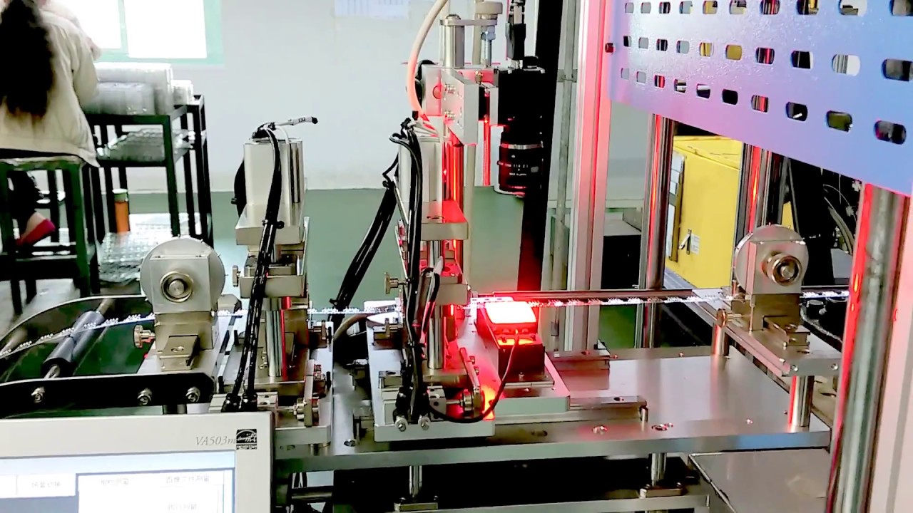 Automatic in-mold injection molding with CCD quality check - YouTube