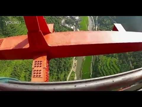 BASE jumping off the ridiculous Aizhai Bridge in Hunan province, China ...