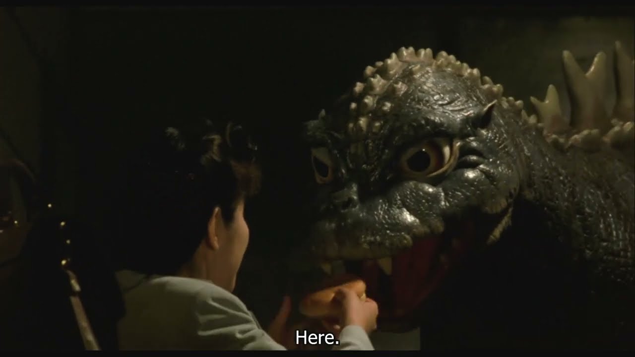 Baby Godzilla eating a burger - YouTube