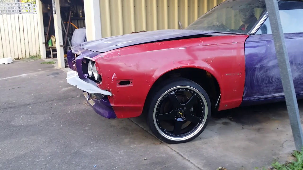 Mazda 121 on new wheels - YouTube