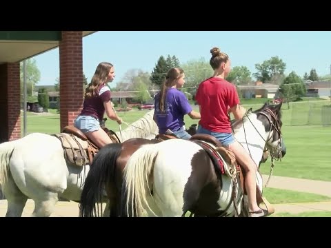 East Middle School students ride horses to school