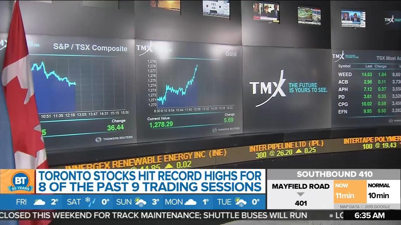 Business report: TSX hits another record high - YouTube