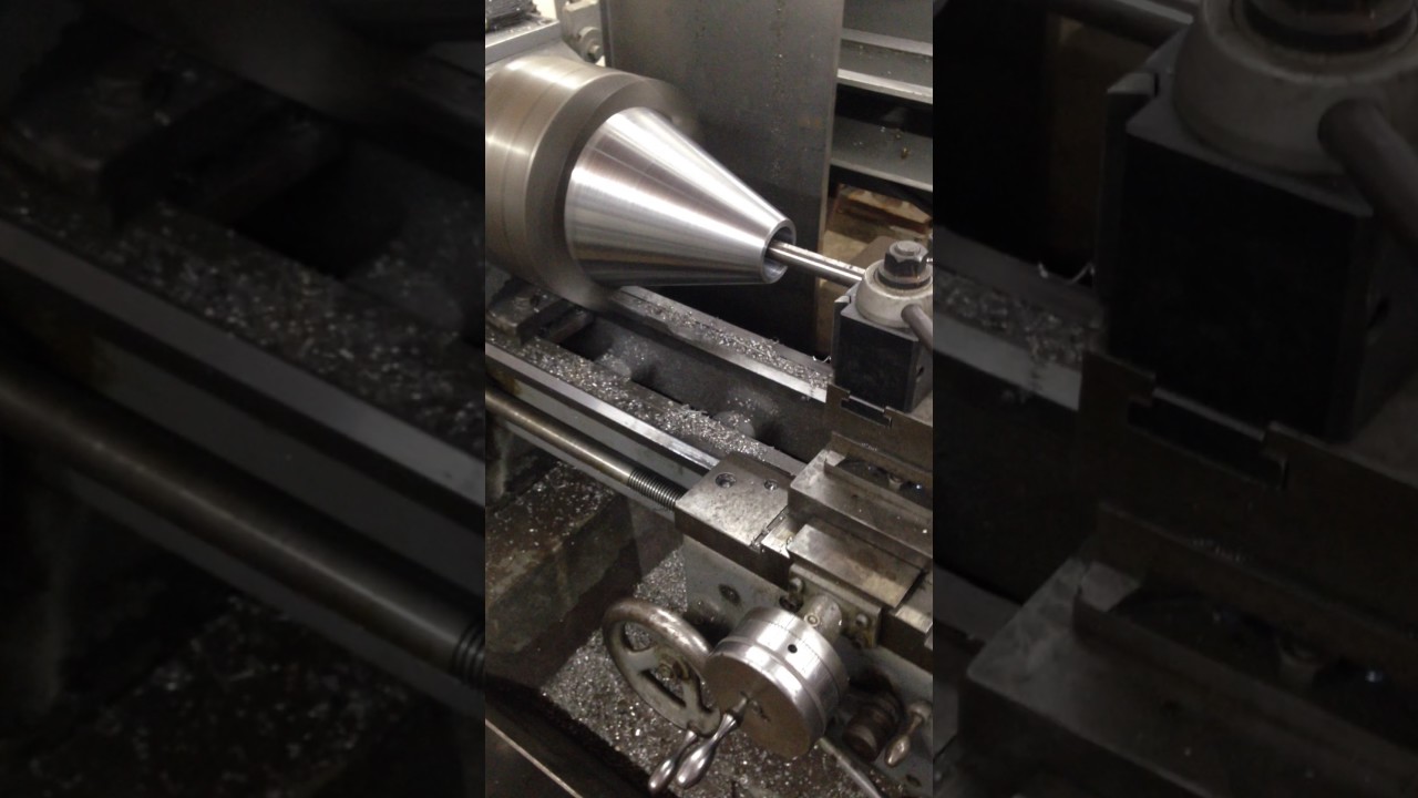 Turning a solid steel cone. - YouTube