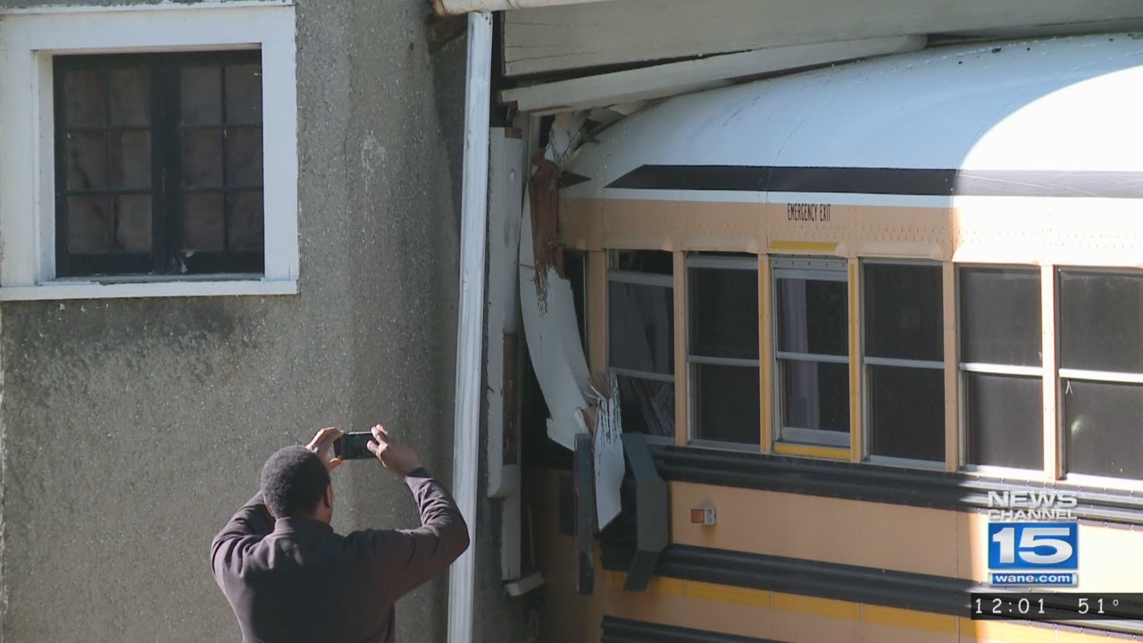 School bus crashes into home - YouTube
