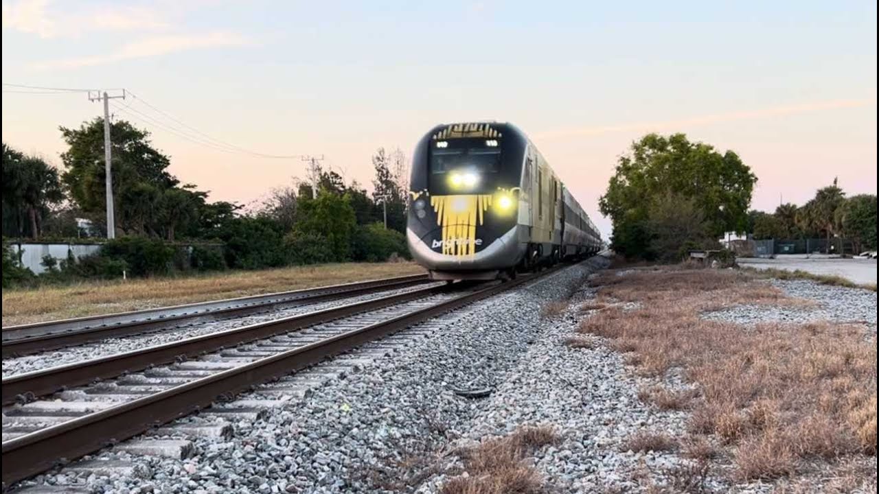 Fast Brightline train passes by with 2 shaves and a haircut - YouTube