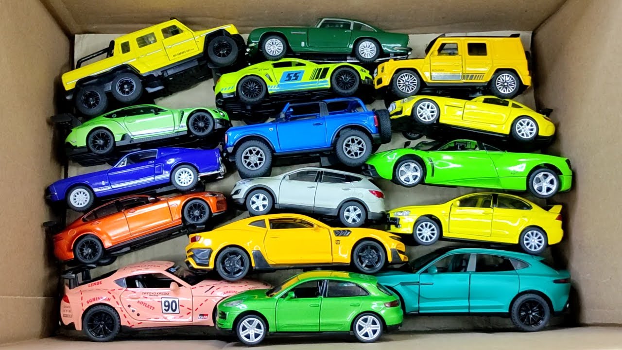 Box full of Diecast Metal Scale Model Cars: Porsche, Audi, BMW, Acura ...