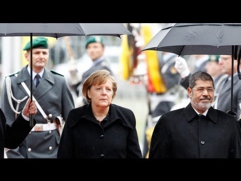 Egypt's Mursi visits Germany amid disorder at home