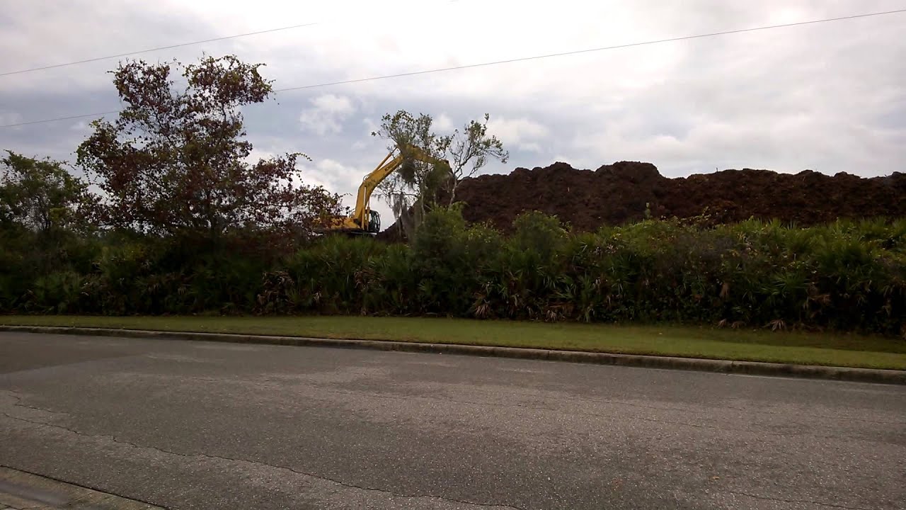 Mulch Berm Across The Street - YouTube