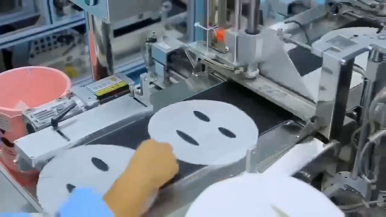 Cosmetics Face Sheet Mask Folding Machine - YouTube