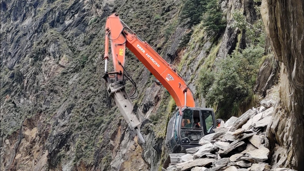 TaTa Hitachi excavator working video on the top of the mountain scratch ...