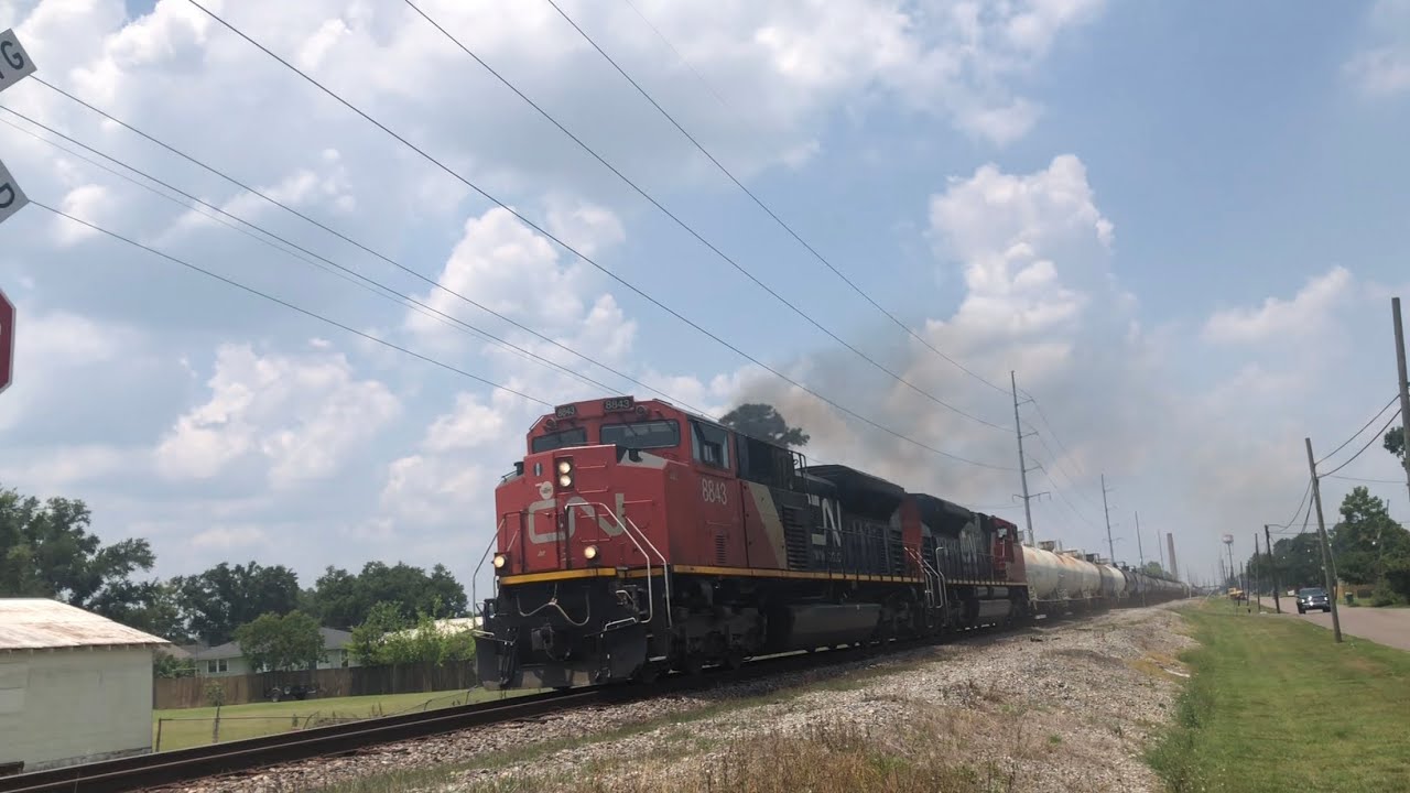 CN 8843 and CN 8020 leads long mixed freight - YouTube