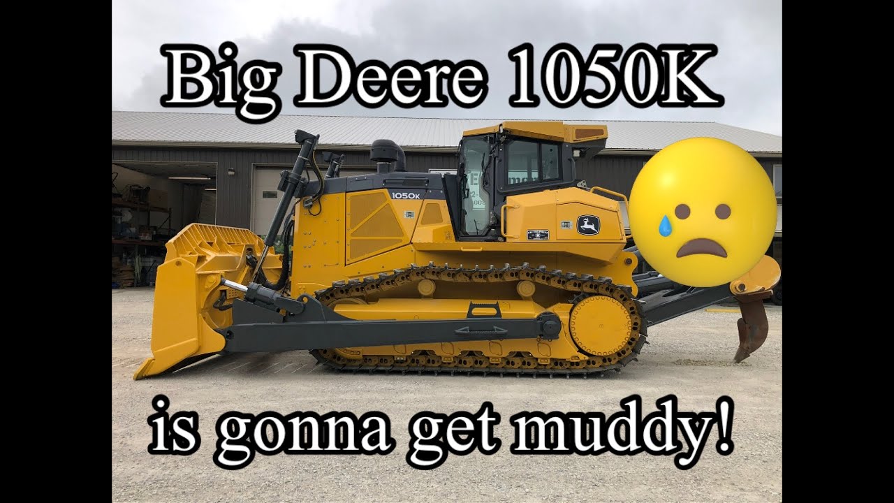 John Deere 1050K dozer pushing dirt and ripping rock along with 850J ...