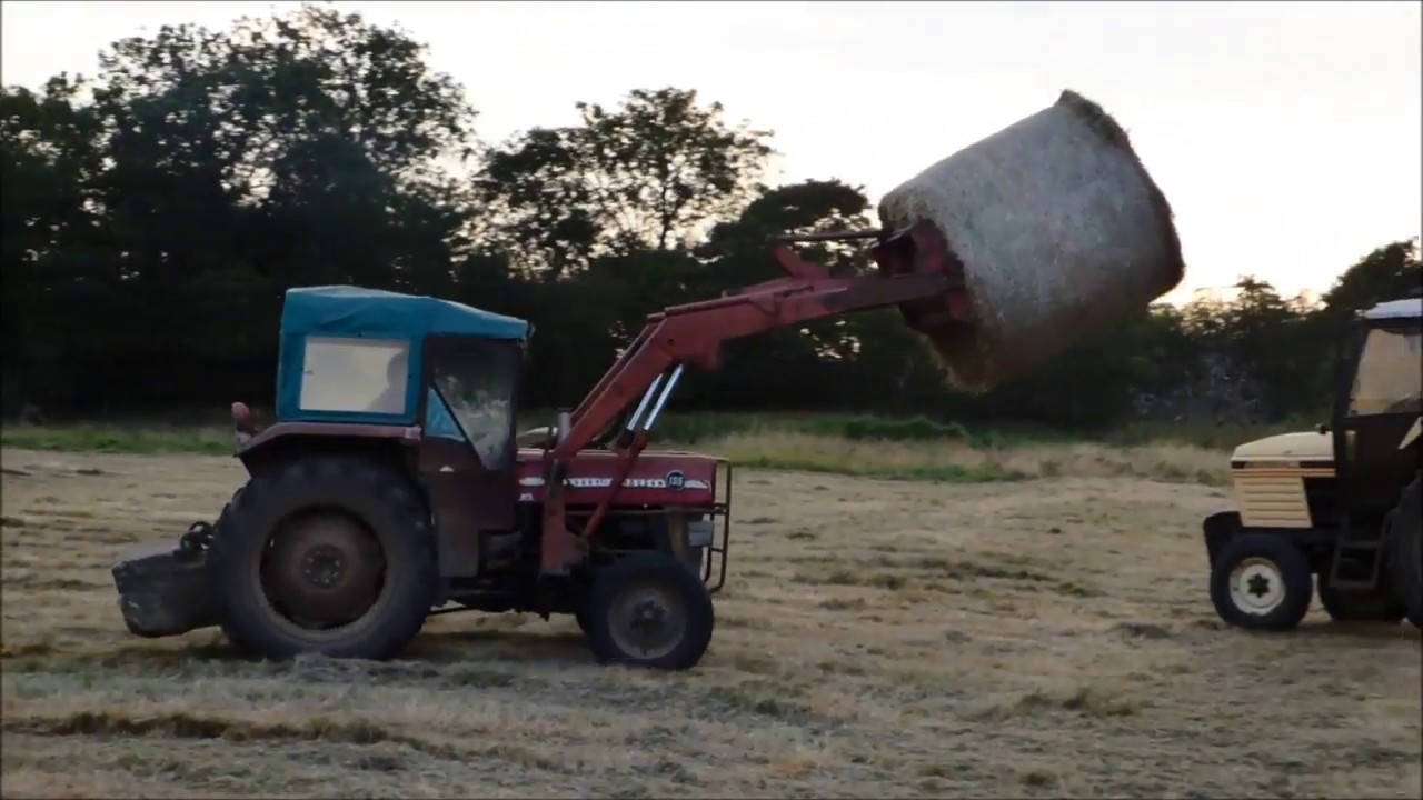 Massey Ferguson Tractor Moving Hay Bales - YouTube