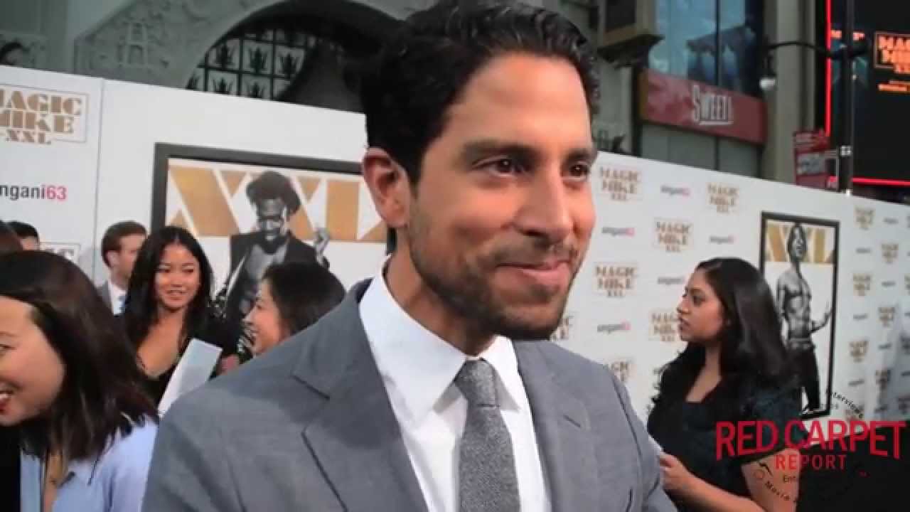 Adam Rodriguez multi-tasks w/us at Premiere of Magic Mike XXL Red ...