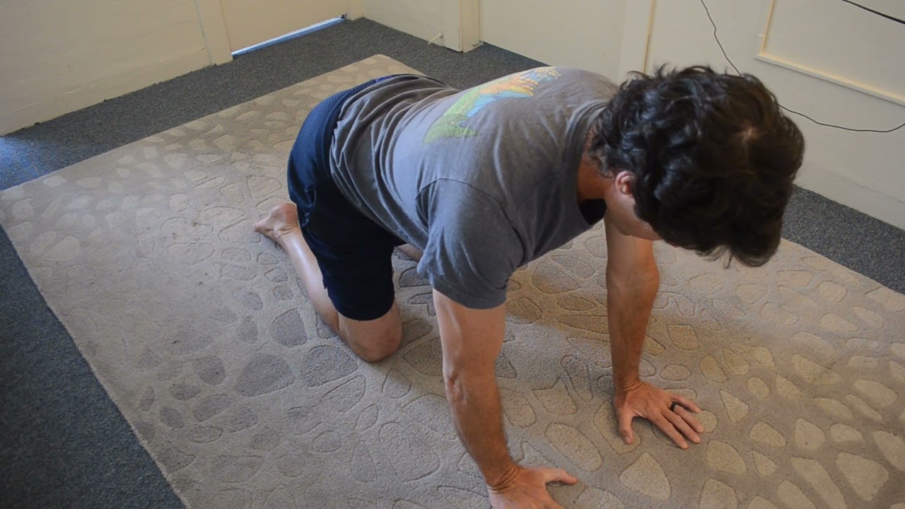 Thoracic rotation range of motion - YouTube