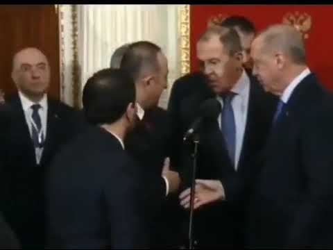 Moskova'da mevlüt Çavuşoğlu Recep Tayyip Erdoğan şaşırıp el sıkıştı