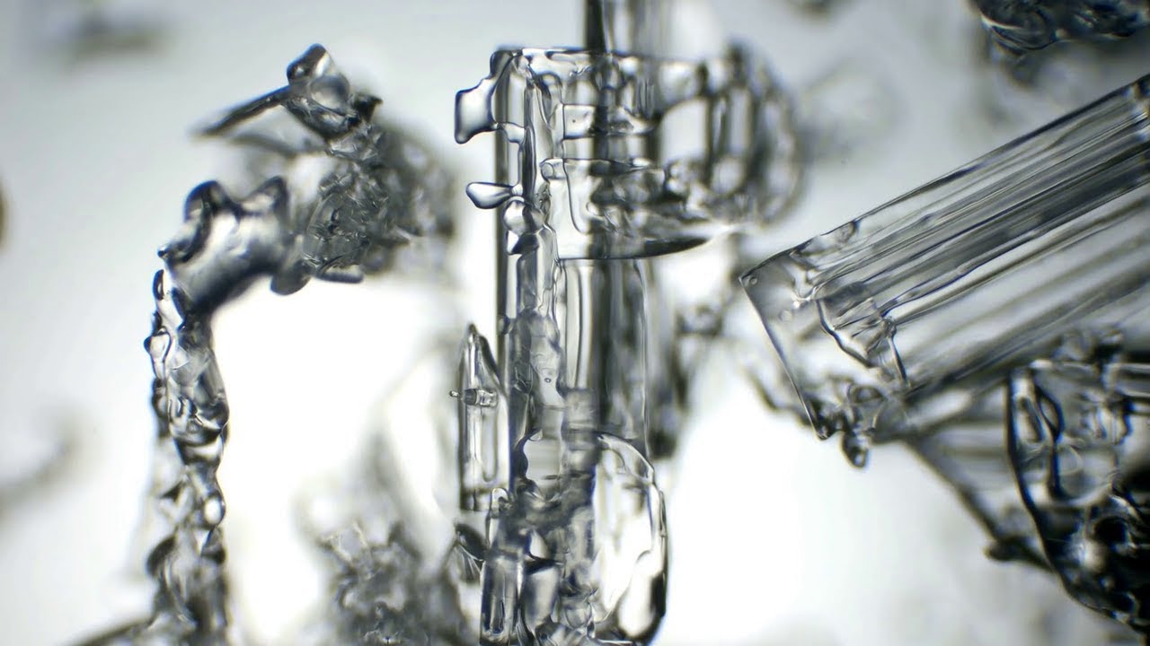 Microscope Video - Ice Melting Experiment Under Microscope - YouTube