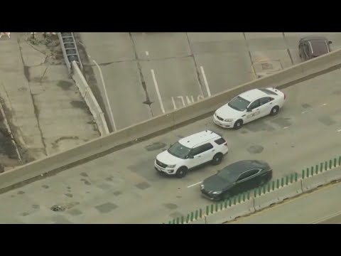 Massive pothole opens up on I-55 bridge - YouTube
